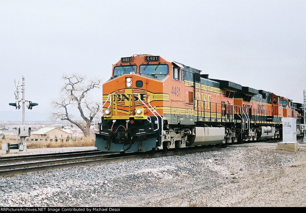 BNSF C44-9W #4481 leads a westbound across Mesa Rd.